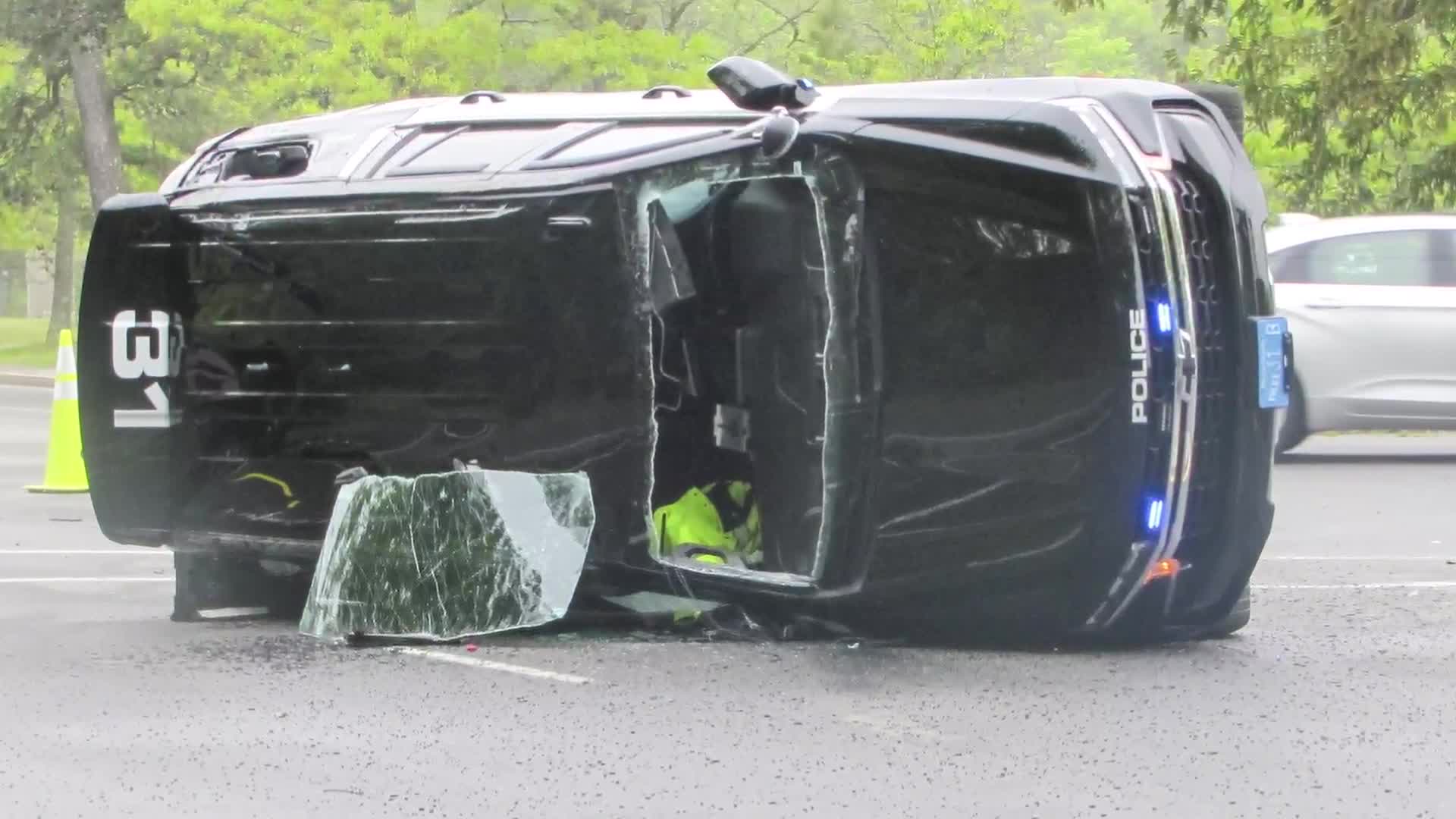 Police officer hospitalized after being pulled from wreckage of ...