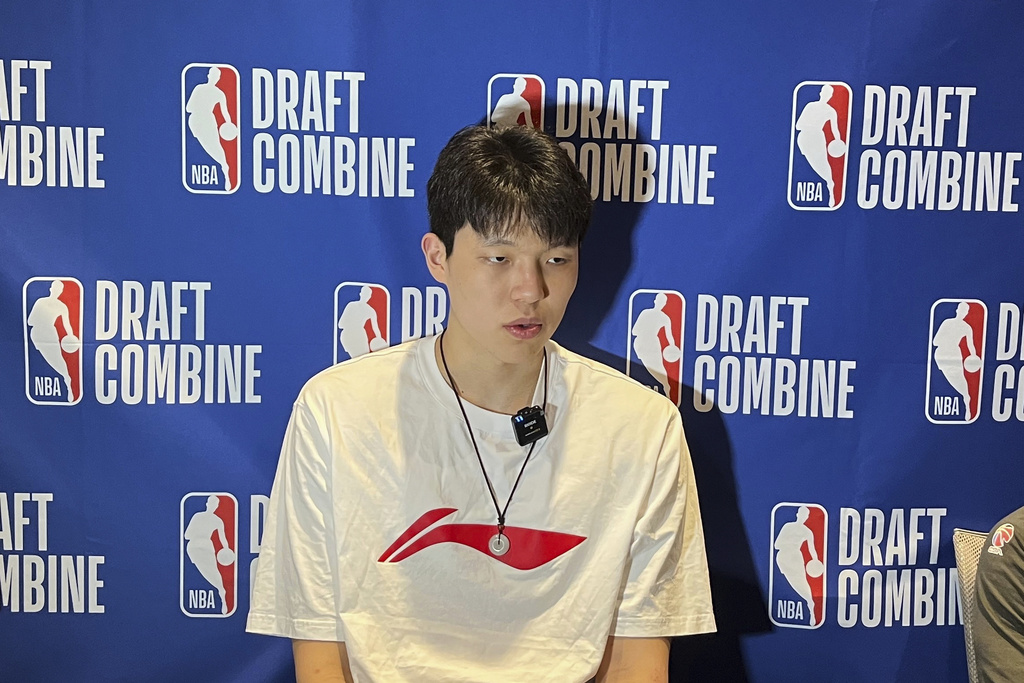 At 7-foot-1 with an ability to score, China's Yang comes to draft ...