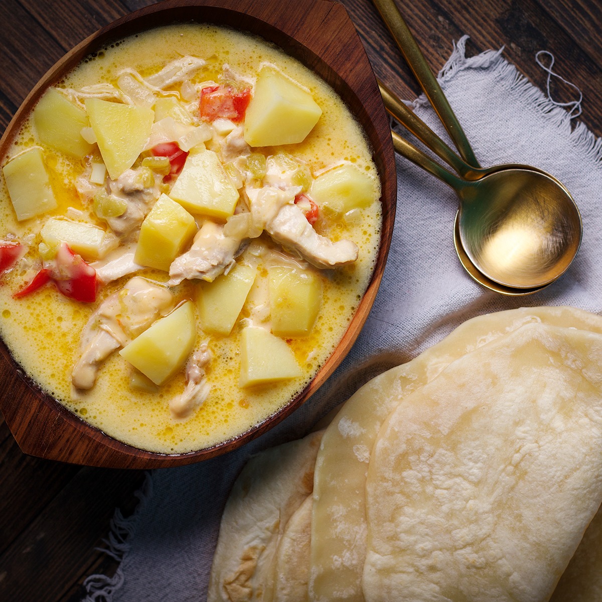 Creamy Chicken and Potato Soup with Chilies and Cheese