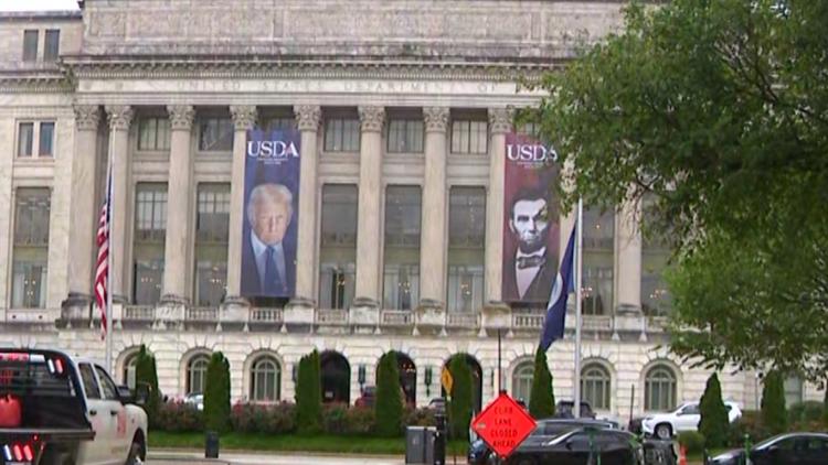 Department of Agriculture drapes photo of Trump next to Lincoln outside ...