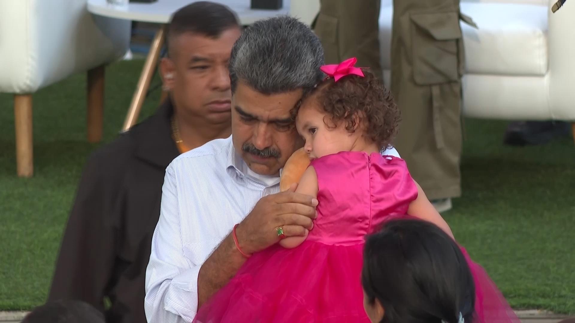 Toddler arrives in Venezuela after being separated from parents when ...