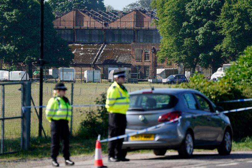 Two firefighters and member of public dead after fire at ex-RAF base