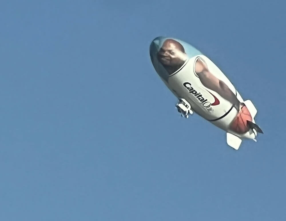 Onlooker sparks outrage with photo of bizarre blimp flying over city ...
