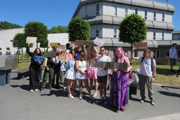 ‘Save our staff’: University students protest against potential job losses