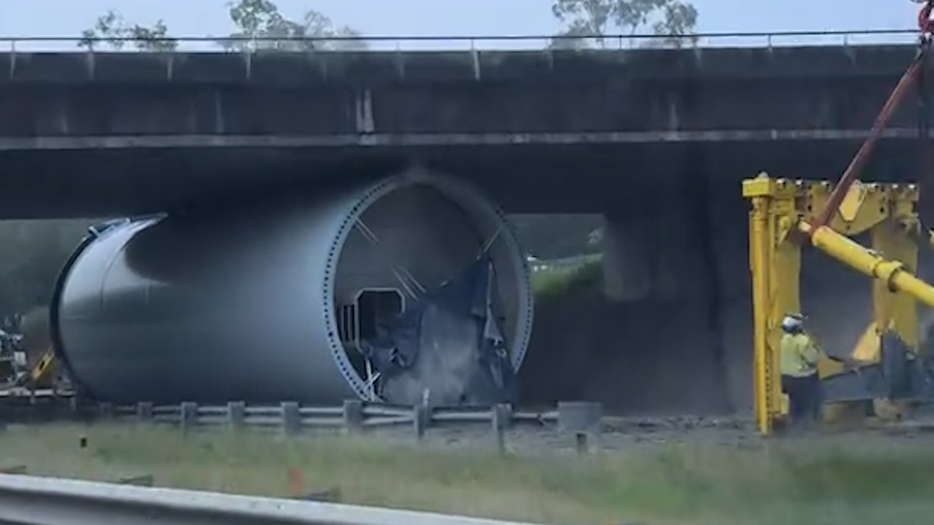 Wind turbine stuck under bridge after truck misses turn