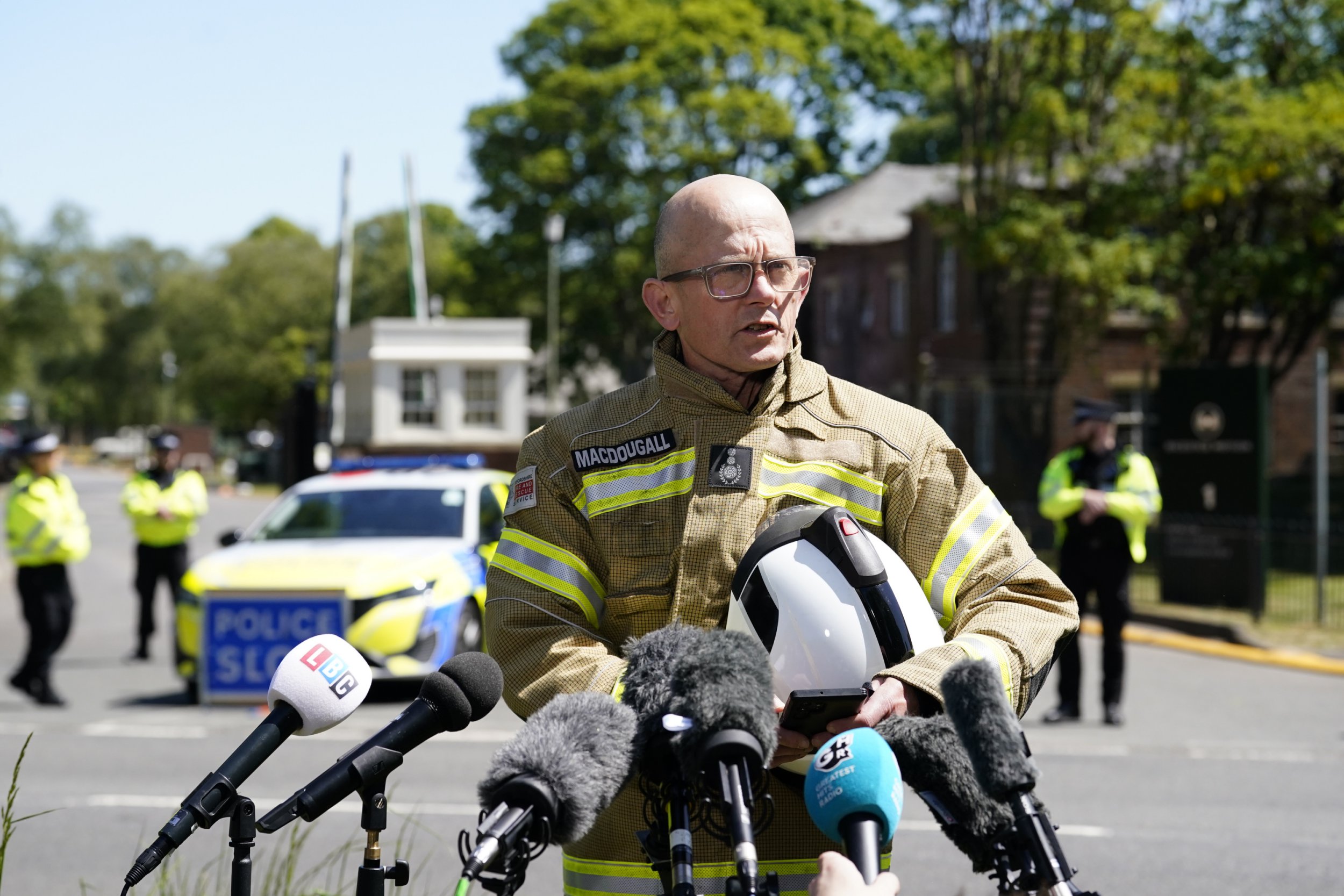Firefighter holds back tears announcing deaths of colleagues in ex-RAF ...