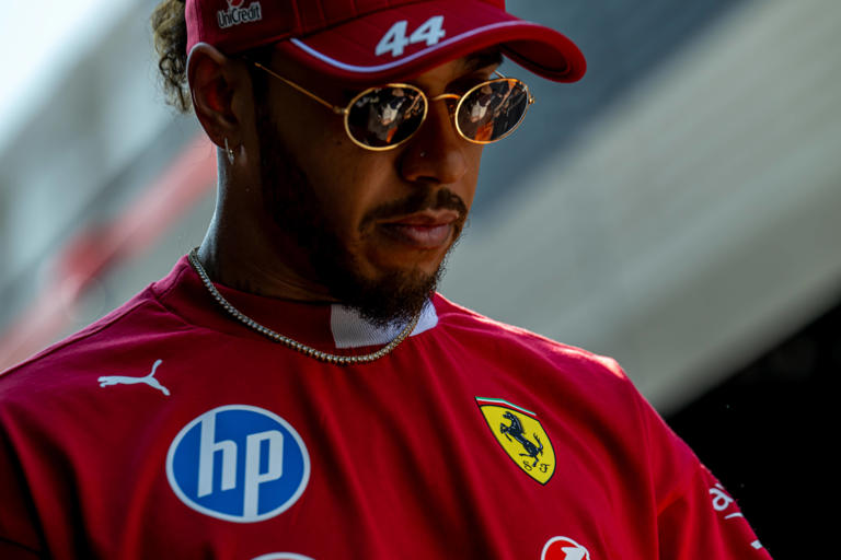 Lewis Hamilton takes Ferrari F1 merchandise OFF fan at Hungarian GP