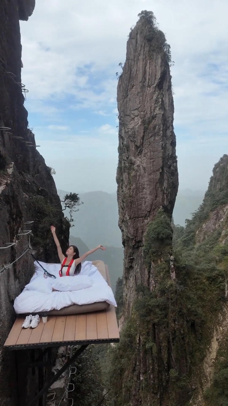 Terrifying attraction lets tourists sleep while suspended over 320-foot ...