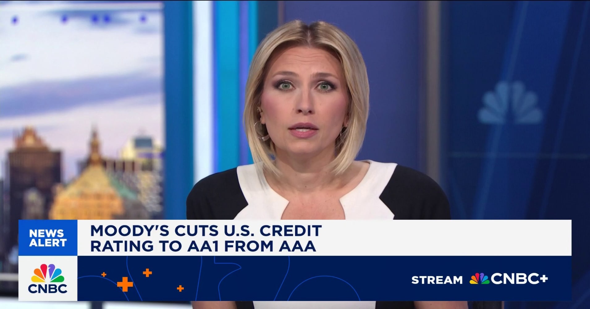 Moody's cuts U.S. credit rating to AA1 from AAA