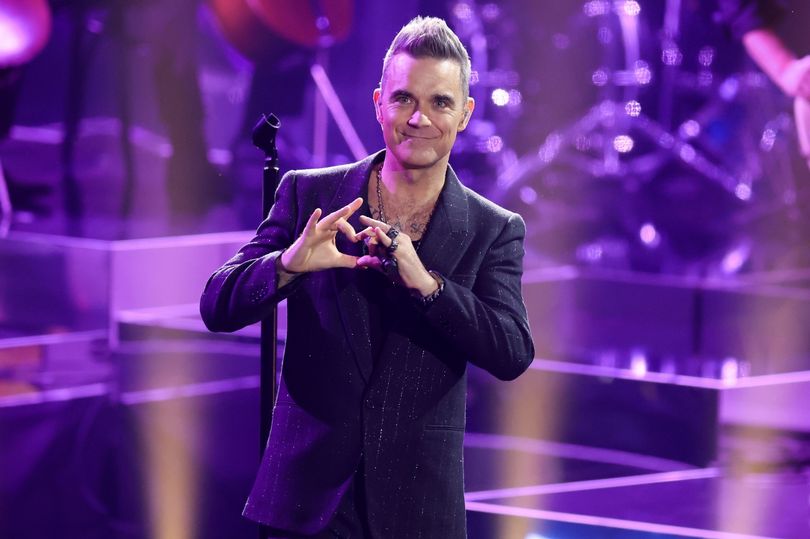 Robbie Williams unveils new album Britpop years after famous Oasis feud