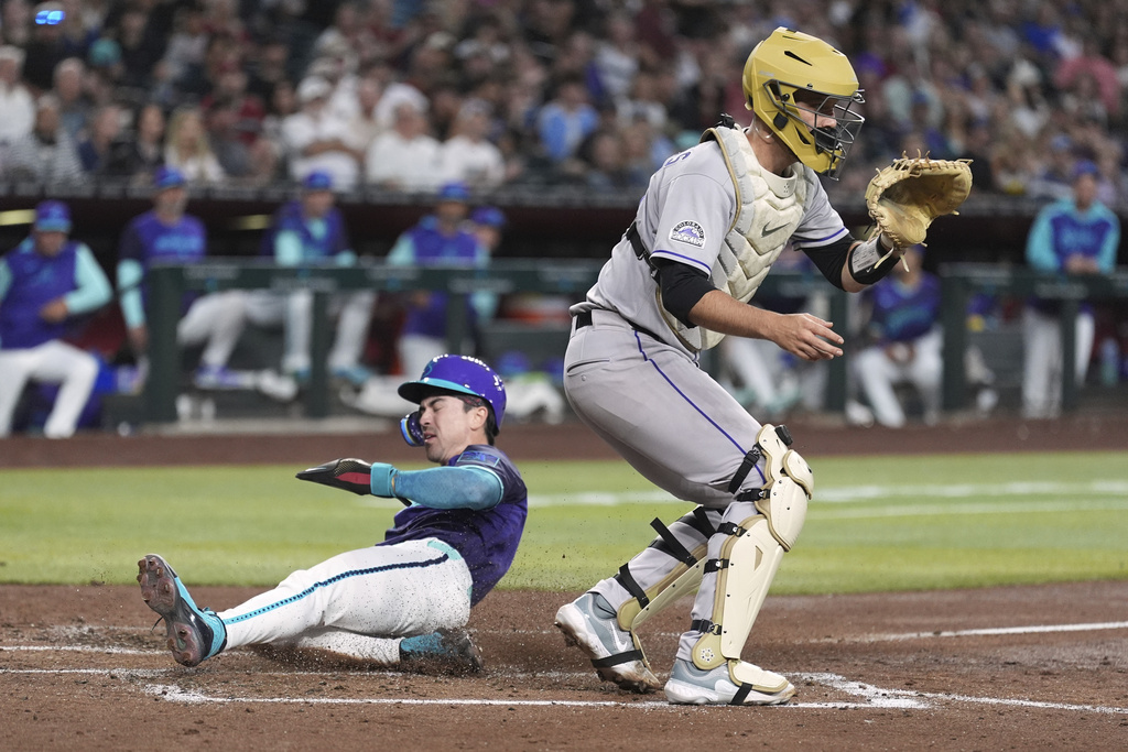 Burnes has a season-high 10 strikeouts, D-backs win 8-0 as Rockies fall ...