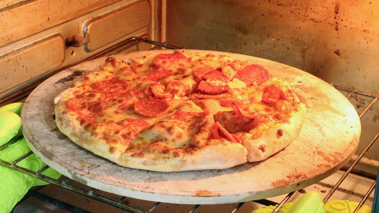 Why You Should Thaw Your Frozen Pizza Before Baking It