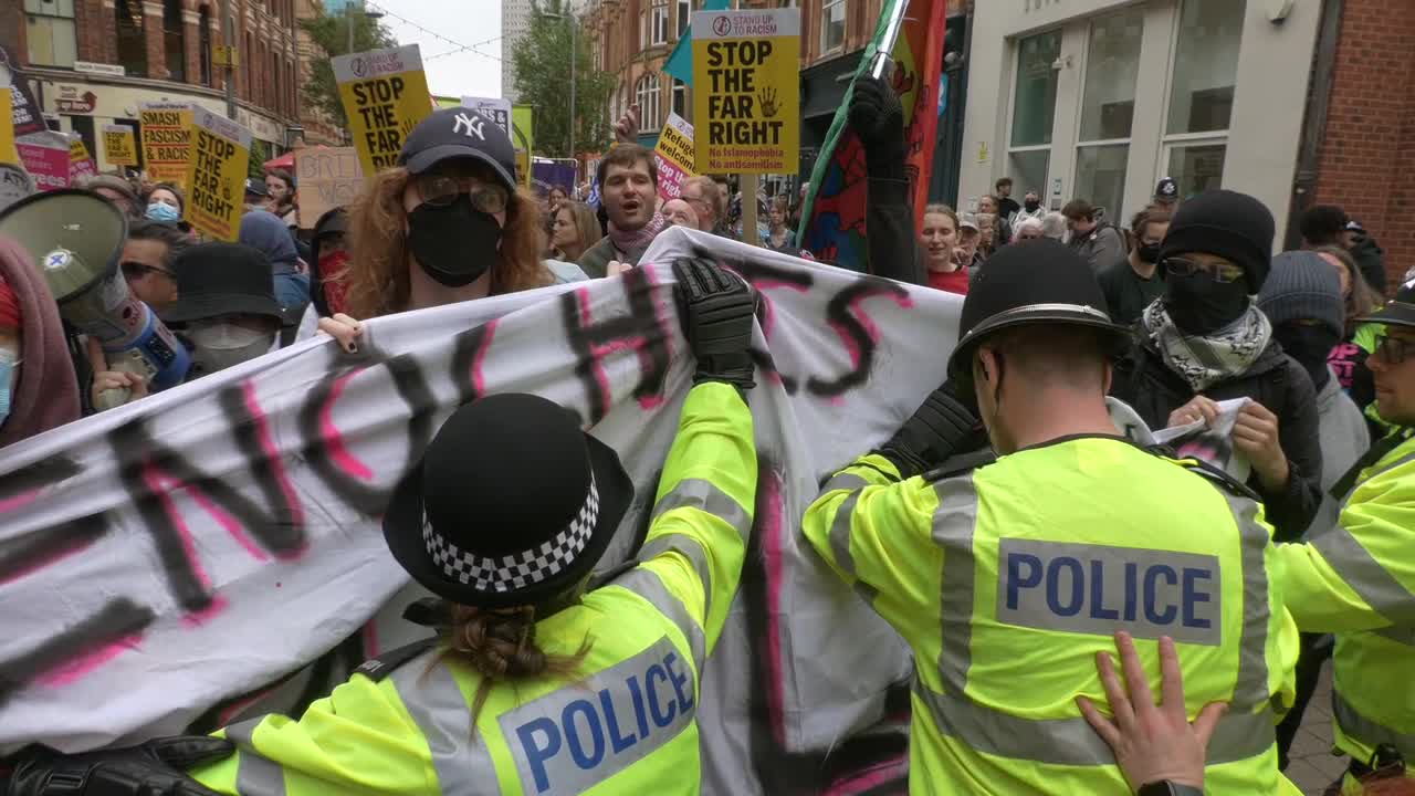 “Get back!” Anti-fascists clash with police in Birmingham as Britain ...
