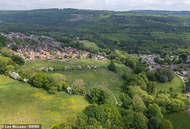 Families in a village that has already doubled in size protest against ...