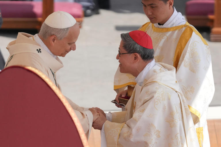Pope Leo holding inaugural mass at the Vatican in front of thousands as crowds chant ‘Viva il Papa’