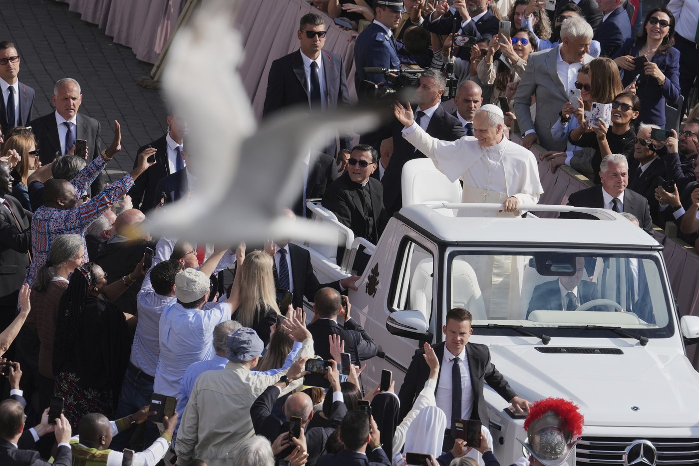 AP PHOTOS: Pope Leo XIV takes his first popemobile ride in St. Peter's ...