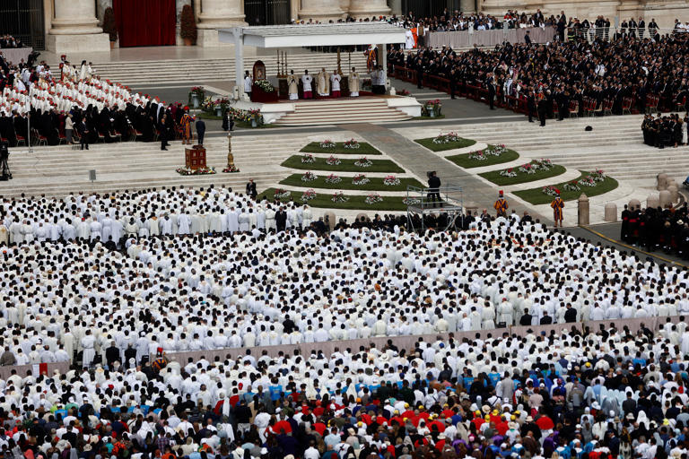 Pope Leo holding inaugural mass at the Vatican in front of thousands as crowds chant ‘Viva il Papa’