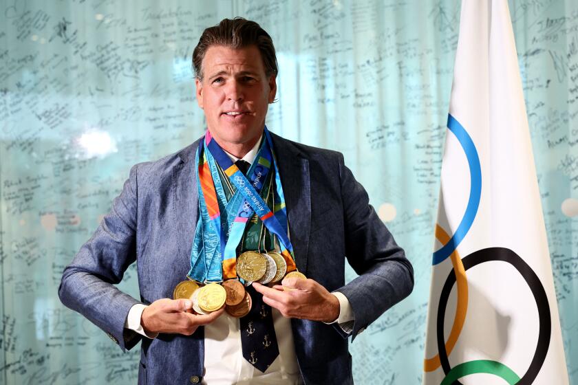 Gary Hall Jr. receives new Olympic medals to replace the 10 he lost in ...