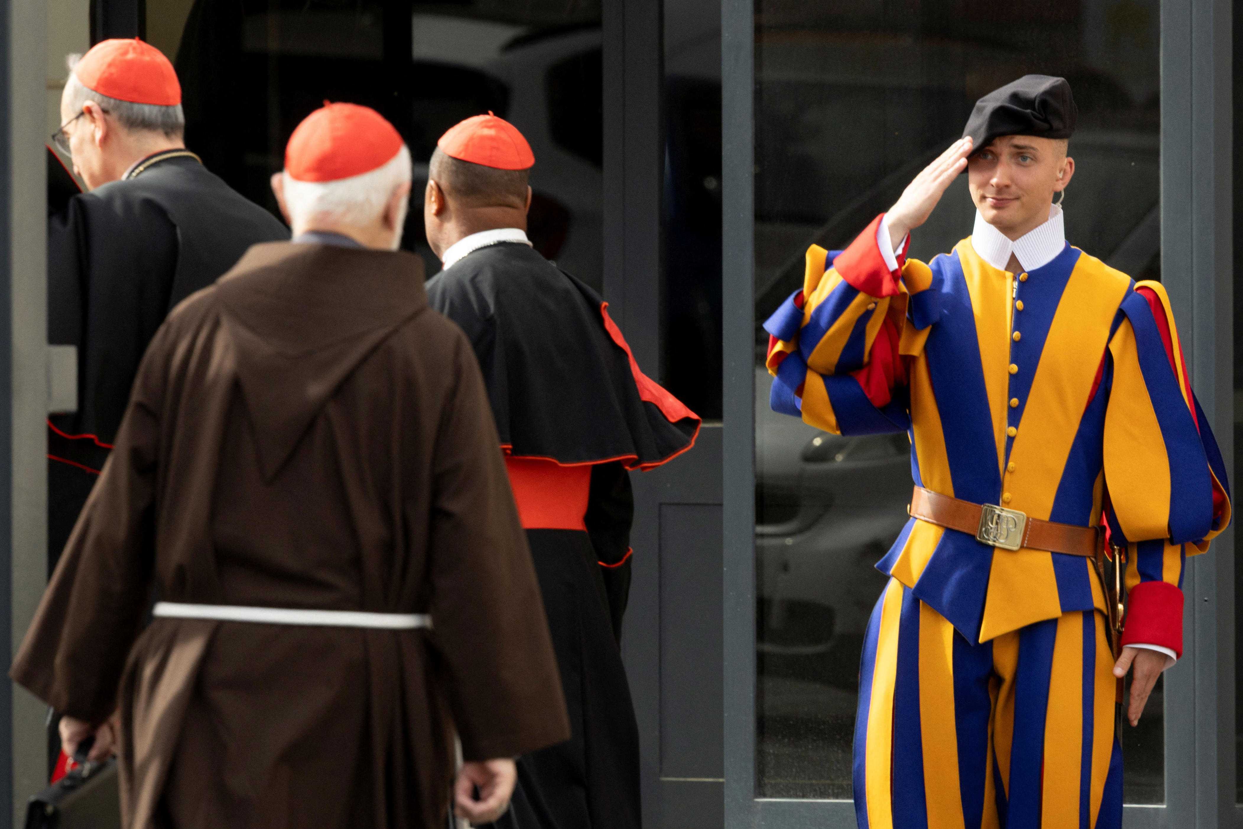 The elite Swiss Guard watching over conclave have a dramatic role as ...