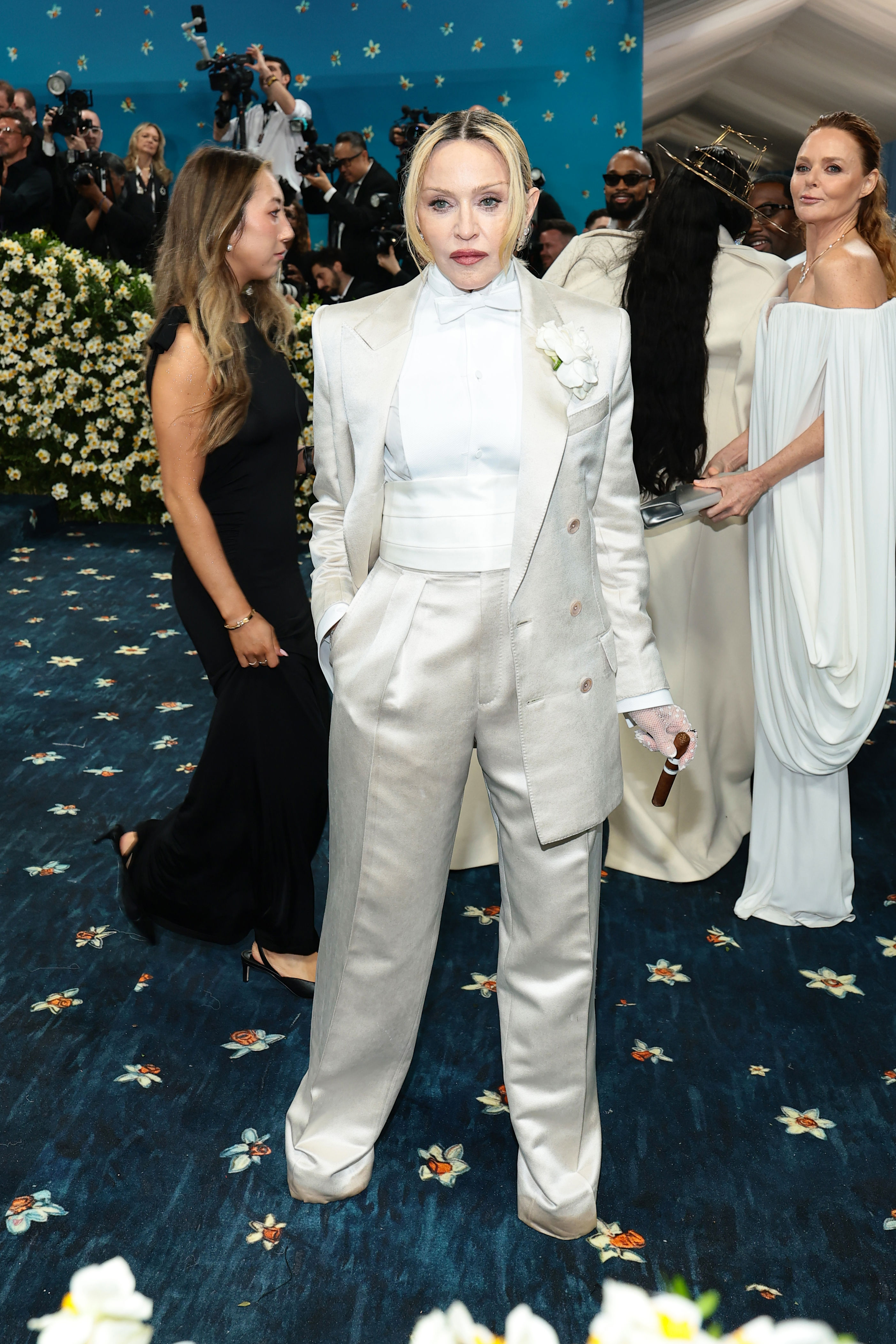 Madonna accessorizes her Tom Ford tuxedo with a cigar on Met Gala 2025 ...