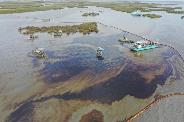 Federal authorities are cleaning up an oil spill in southeast Louisiana