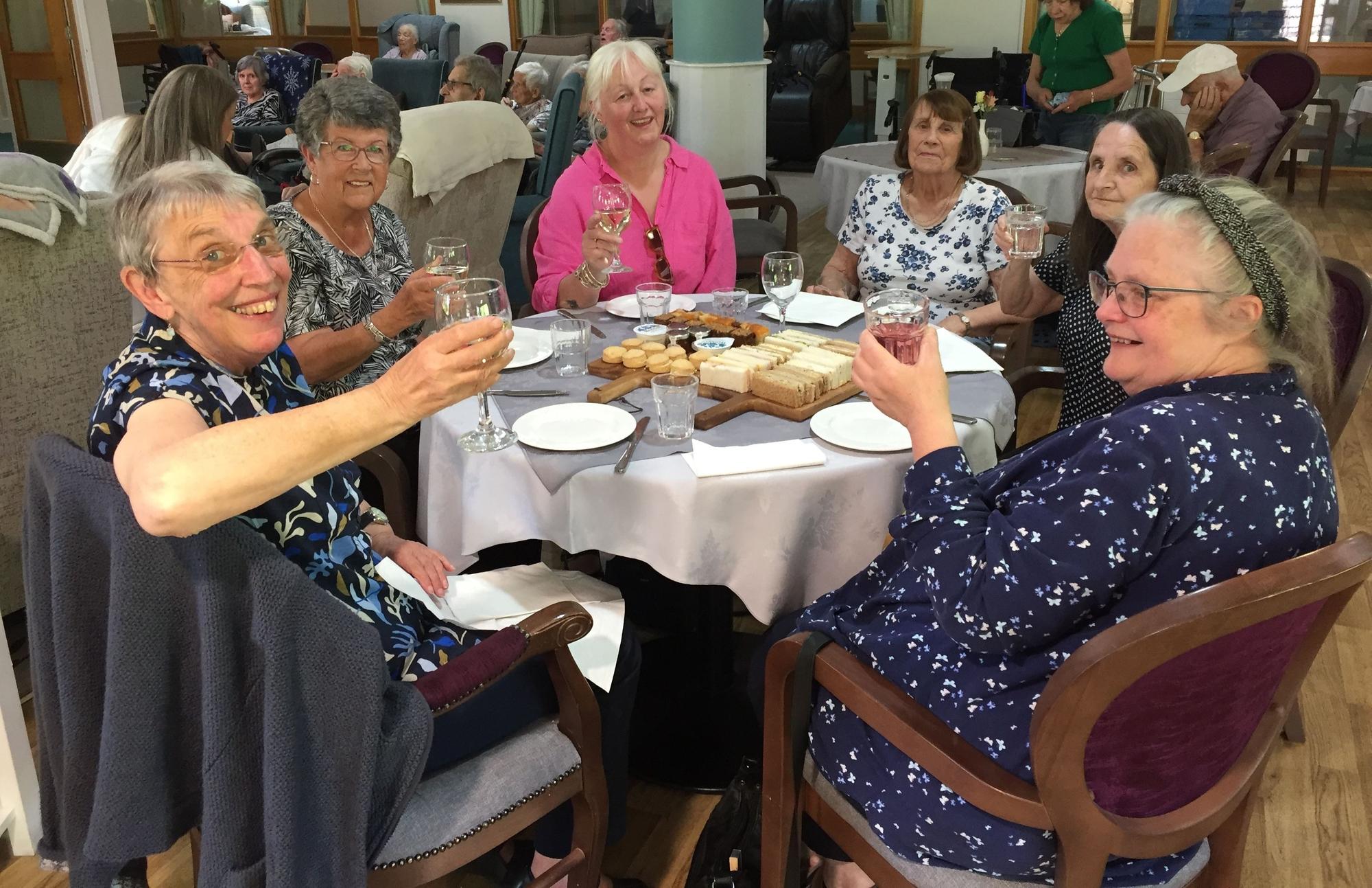 Local care home presents cheque to local club