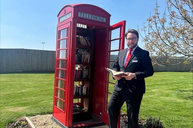 Phone box transformed into book swap library