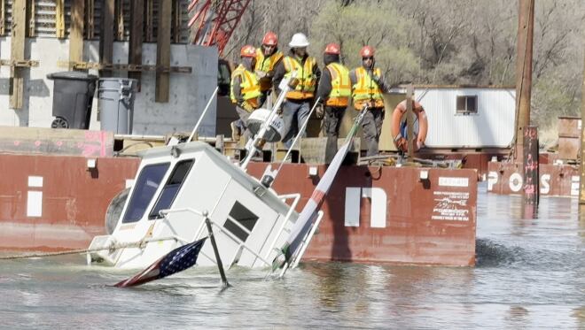 Reduction in water flow from Garrison dam to help recover tugboat