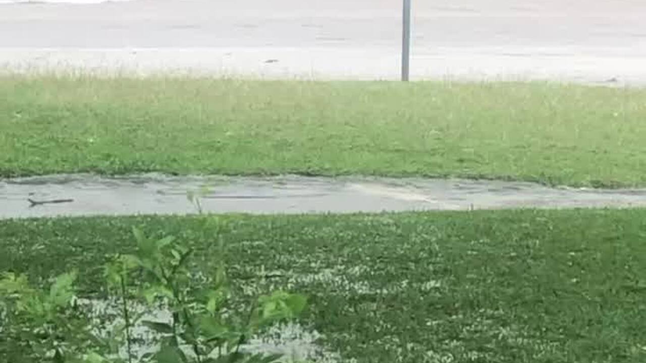Video captures heavy rainfall, rising flood water