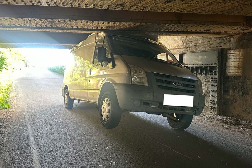 Driver flees across fields after van gets stuck under Cambridgeshire ...
