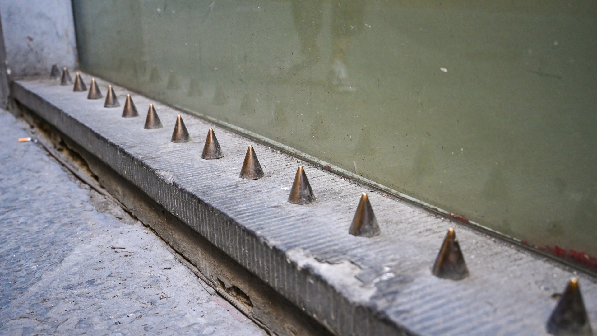 The controversy surrounding anti-homeless structures in cities