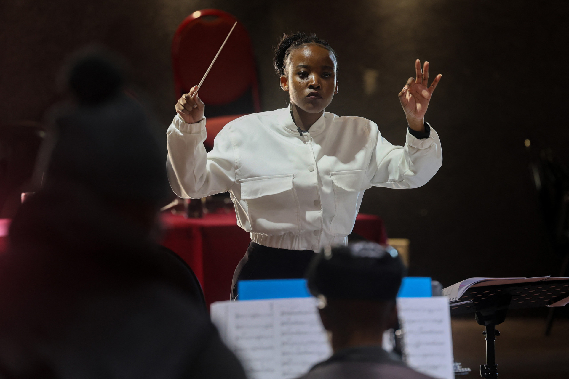 What is the point of a classical music conductor?