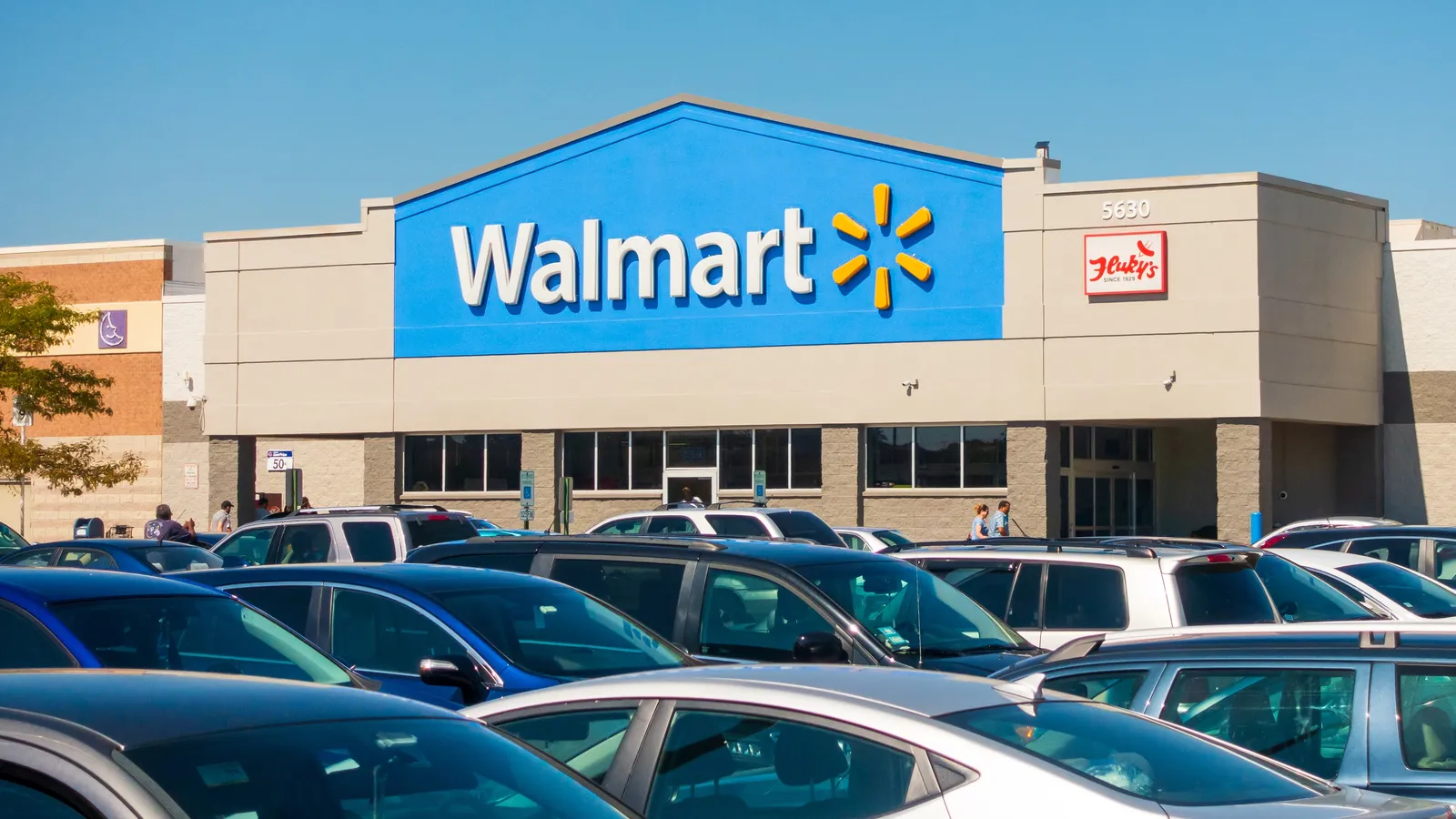 Walmart says drivers are buying less than 10 gallons as full tanks get ...