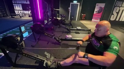 John Devaney demonstrating rowing on the RowErg