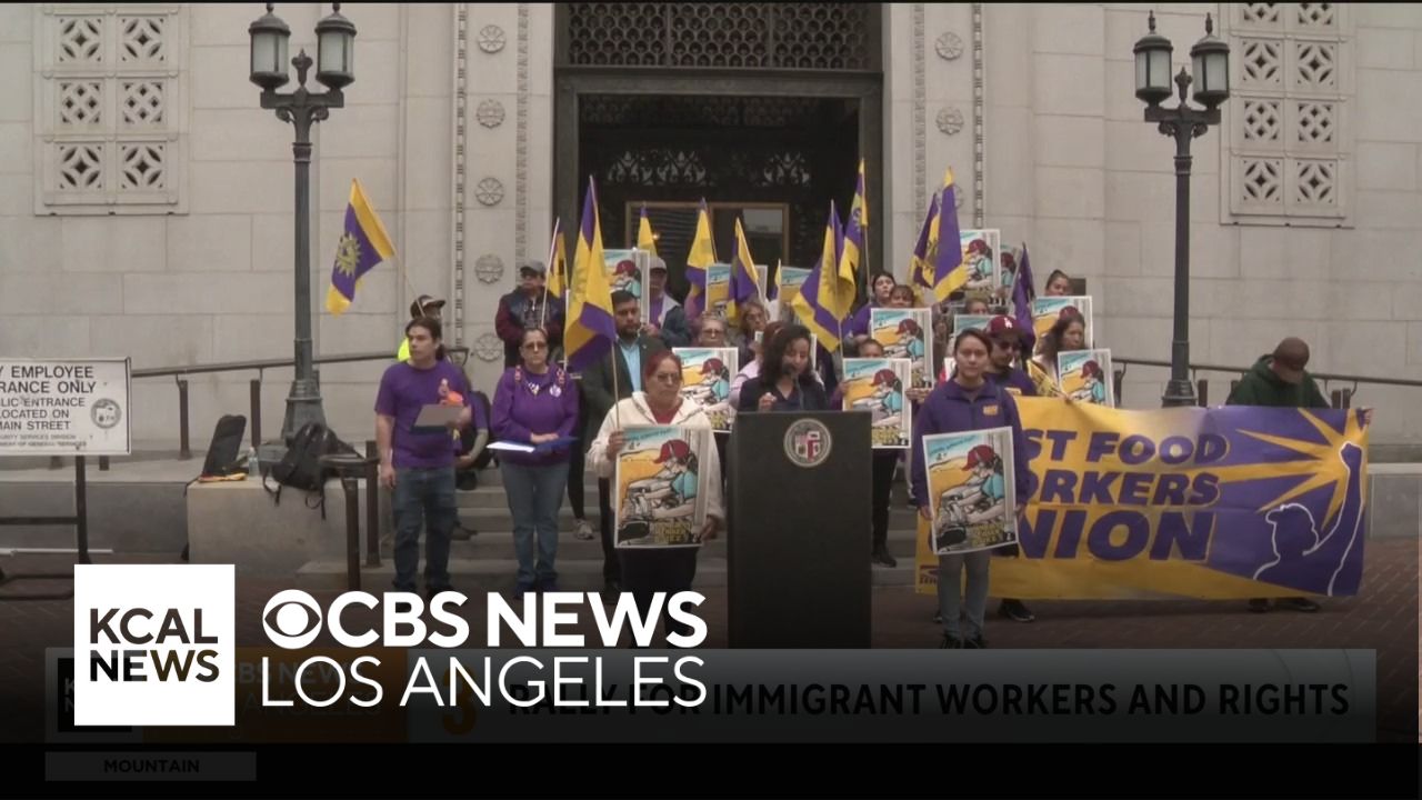 Fast food workers rally at Los Angeles City Hall for immigrant rights