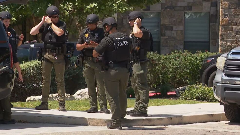 SWAT team arrests barricaded suspect after knife threats at North Side ...