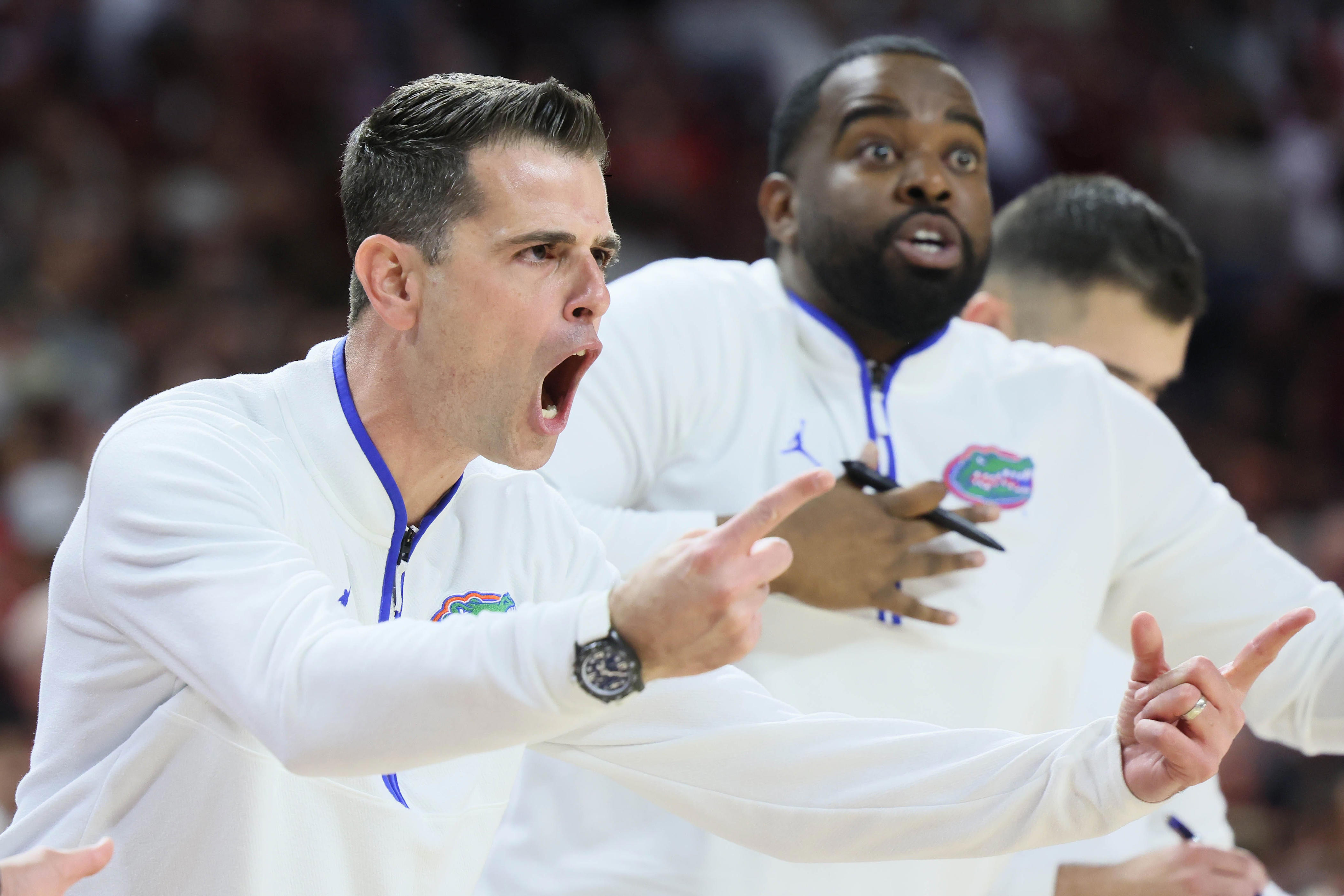 Florida basketball's Todd Golden throws first pitch at Cubs game. Did ...