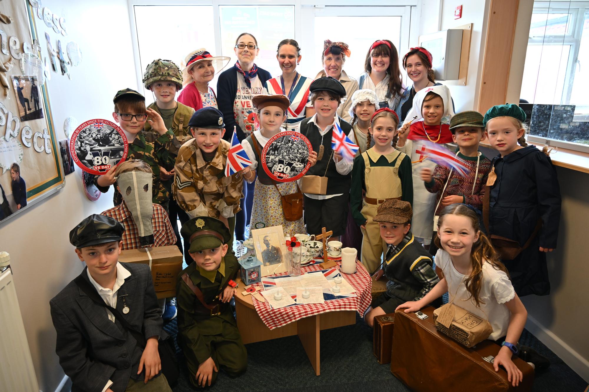 Children and staff at Castor CoE Primary School celebrate VE Day