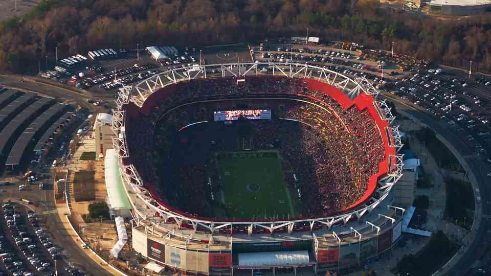 Watch the Army’s Elite Skydivers Drop Straight Into a Packed NFL Arena