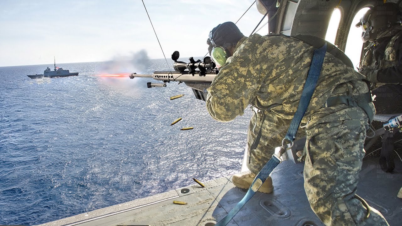 US Skilled Marine Sniper Shoots Moving Target from Helicopter at Sea