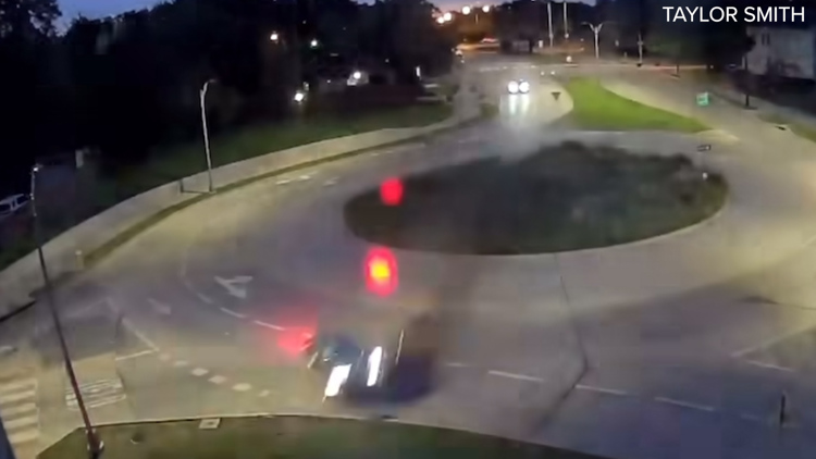 Video shows car fly over traffic circle in crash in Dallas