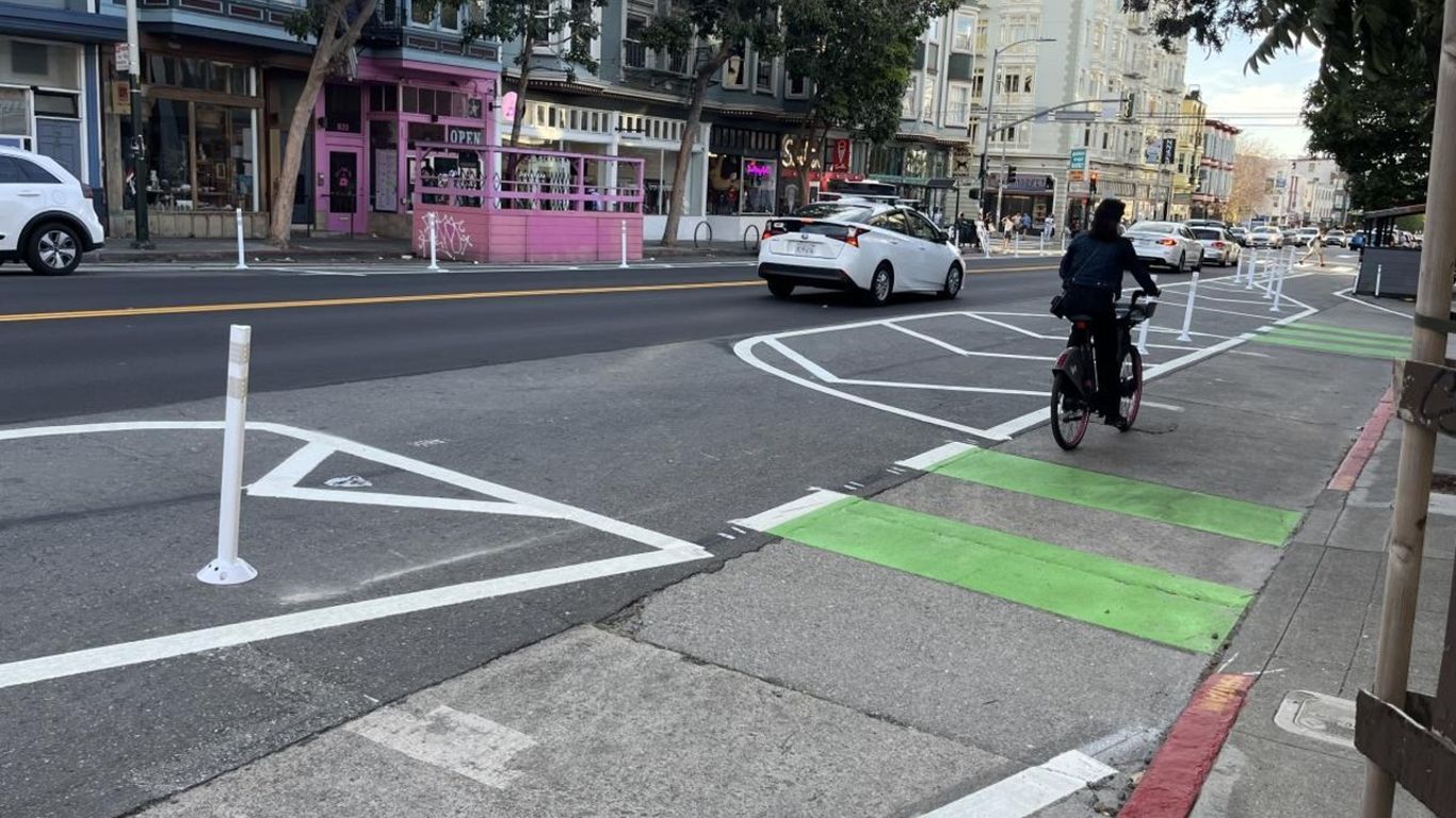 Valencia Street unveils new curbside bike lane after center-lane ...