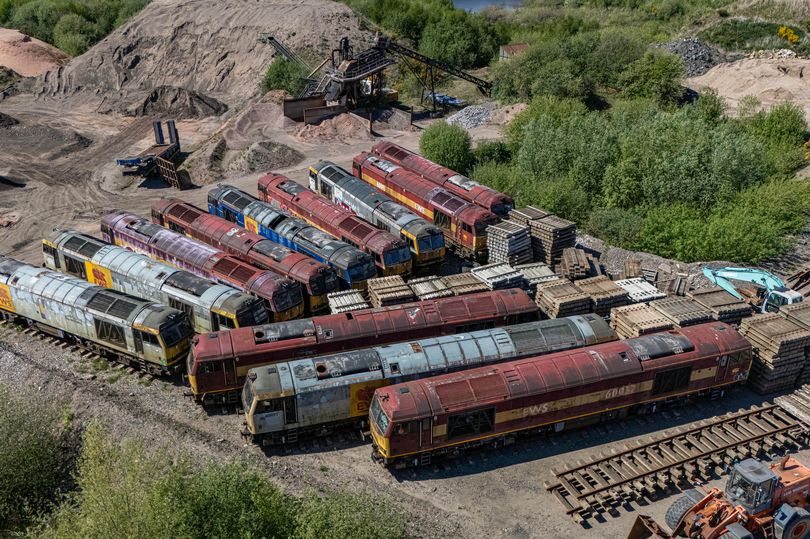 Inside eerie train graveyard as 12 locomotives left to rust away for 35 ...