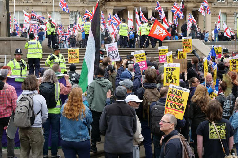 Urgent inquiry call as anti-migrant hate group blasts messages from ...