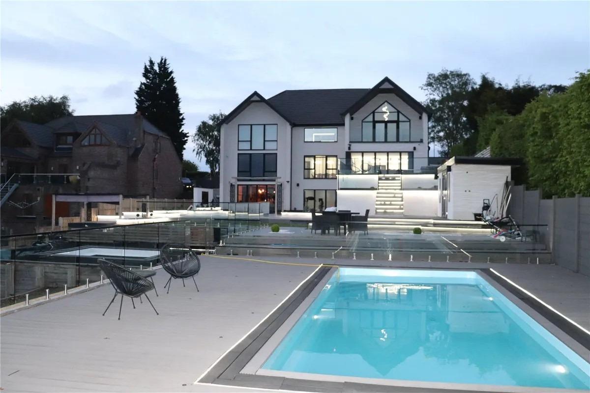 WOW: Ashfield house with pool, cinema, bar, gym, and golf simulator is ...