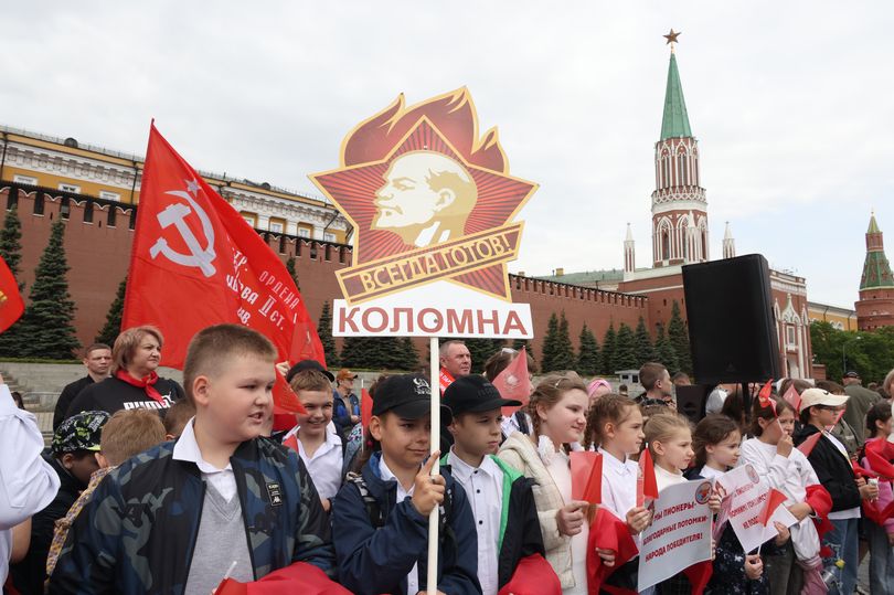 Russia's massive Soviet-era communist parade as Lenin's face lauded in ...