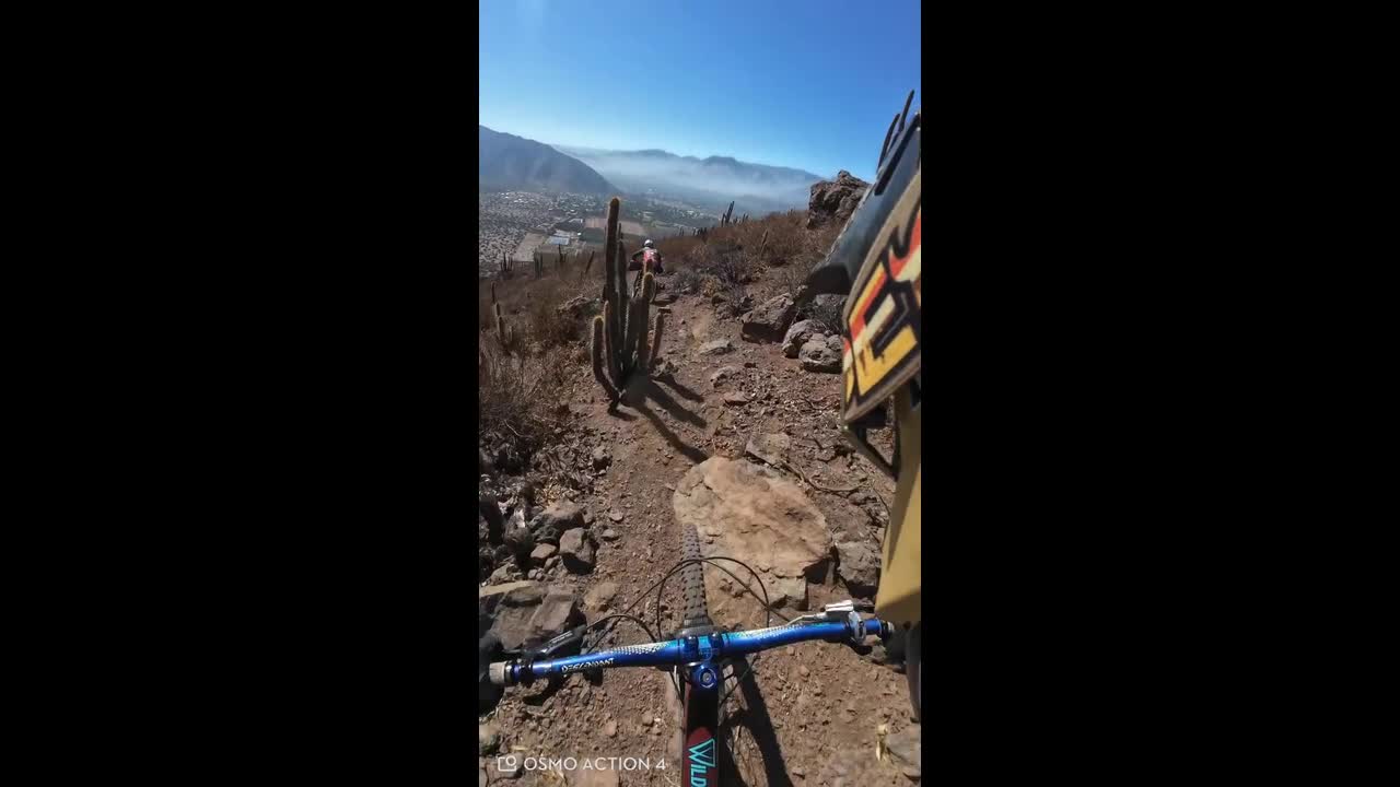 Biker loses balance and falls during downhill ride in San Felipe, Chile