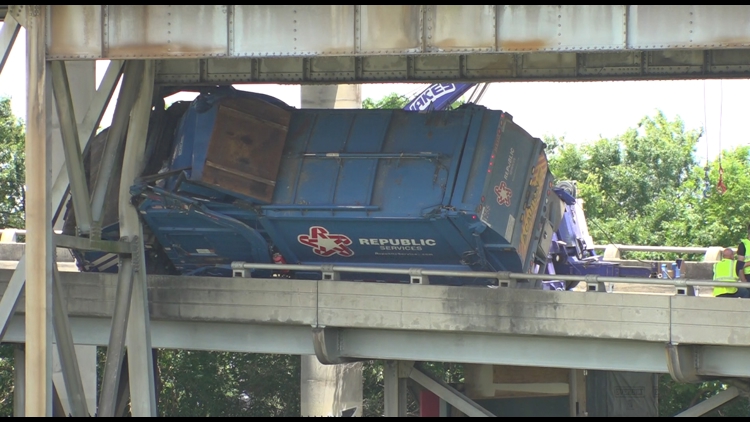 Stuck garbage truck to remain on I-10 ramp for at least two more weeks ...