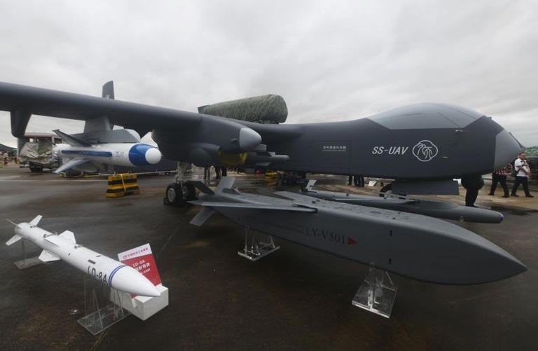 China unveils world first aerial aircraft carrier capable of deploying hundreds of automated ...