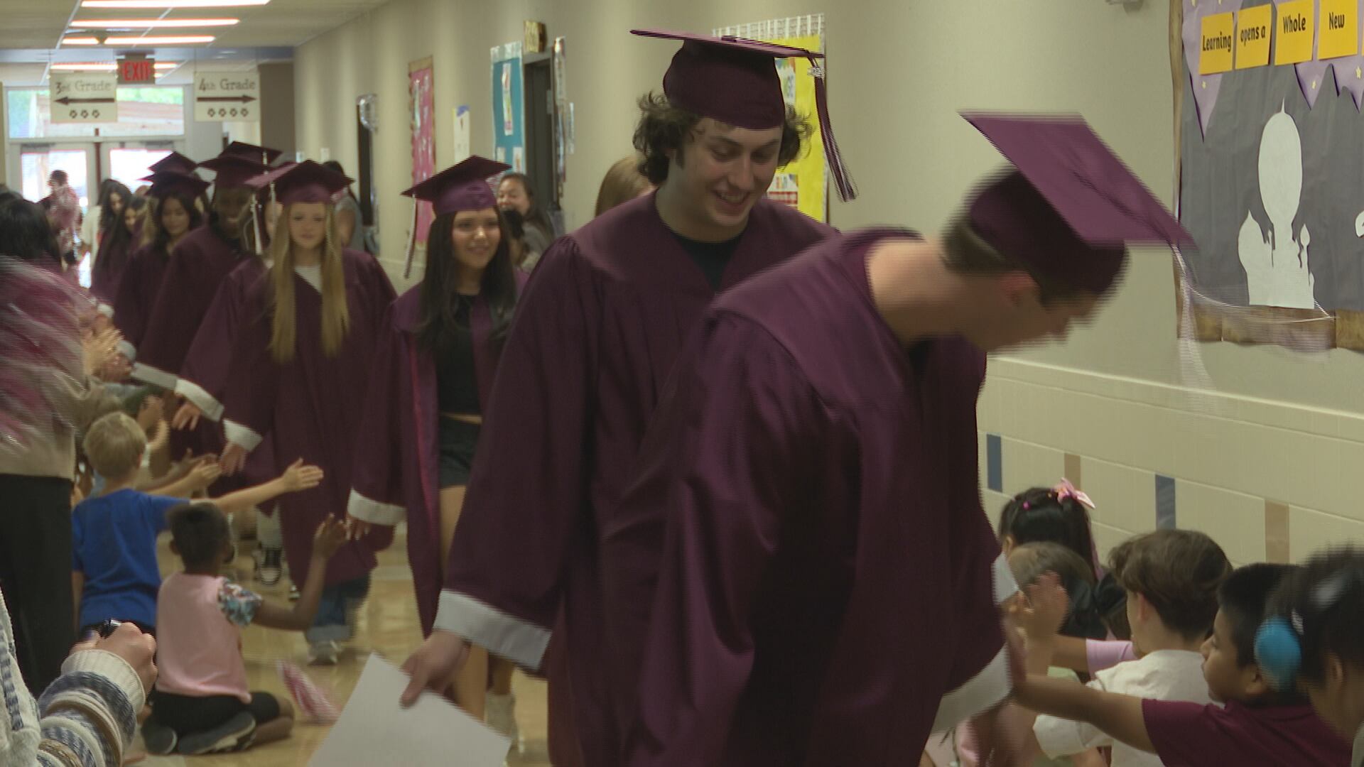 Graduating College Station ISD seniors walk halls of their elementary ...